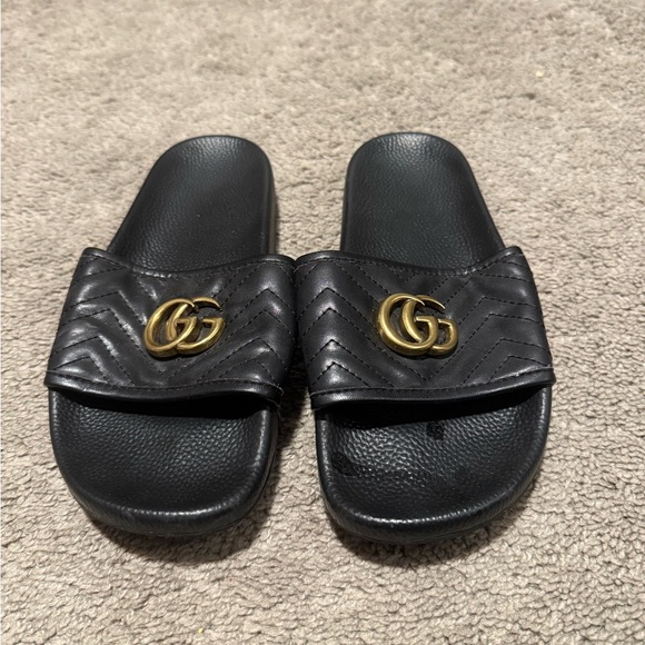 Gucci | Shoes | Gucci Black Slides With Gold Emblem | Poshmark